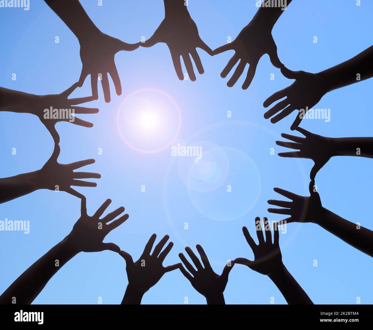 Multiracial hands in a circle hi-res stock photography and images - Alamy