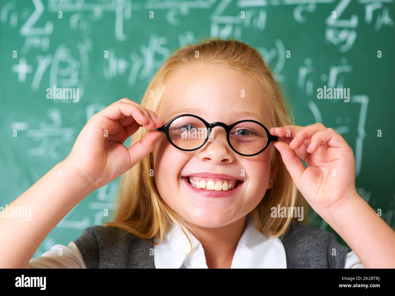 Let me put my glasses on first. Portrait of a cute blonde girl ... Let me put my glasses on first. Portrait of a cute blonde girl ...