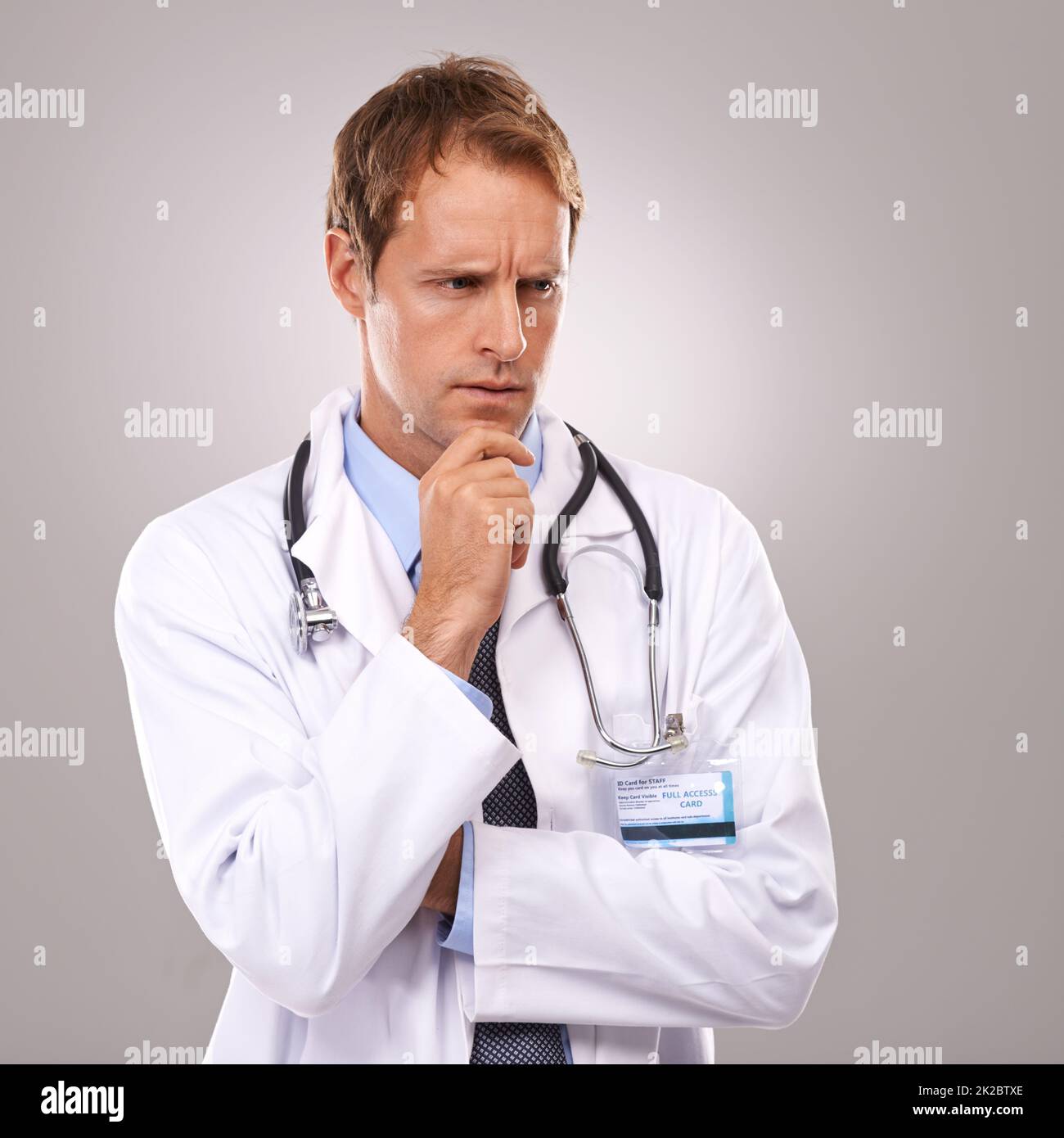 Handsome doctor hi-res stock photography and images - Alamy