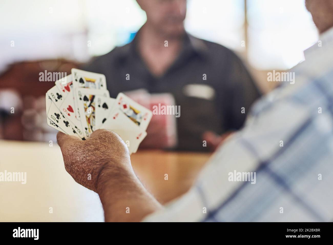 Two People Playing Cards