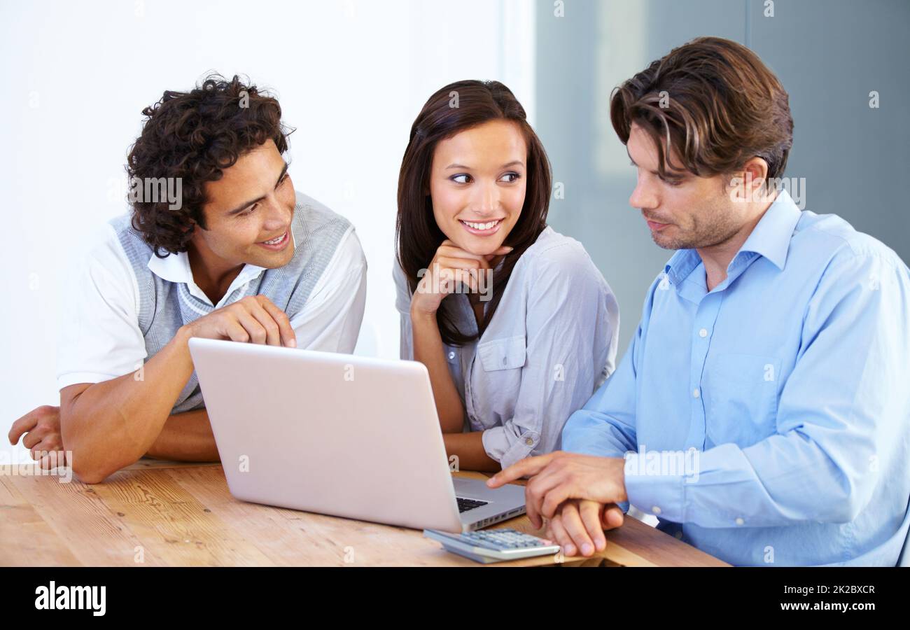 Teamwork to get the job done. A group of young entrepreneurs having a ...