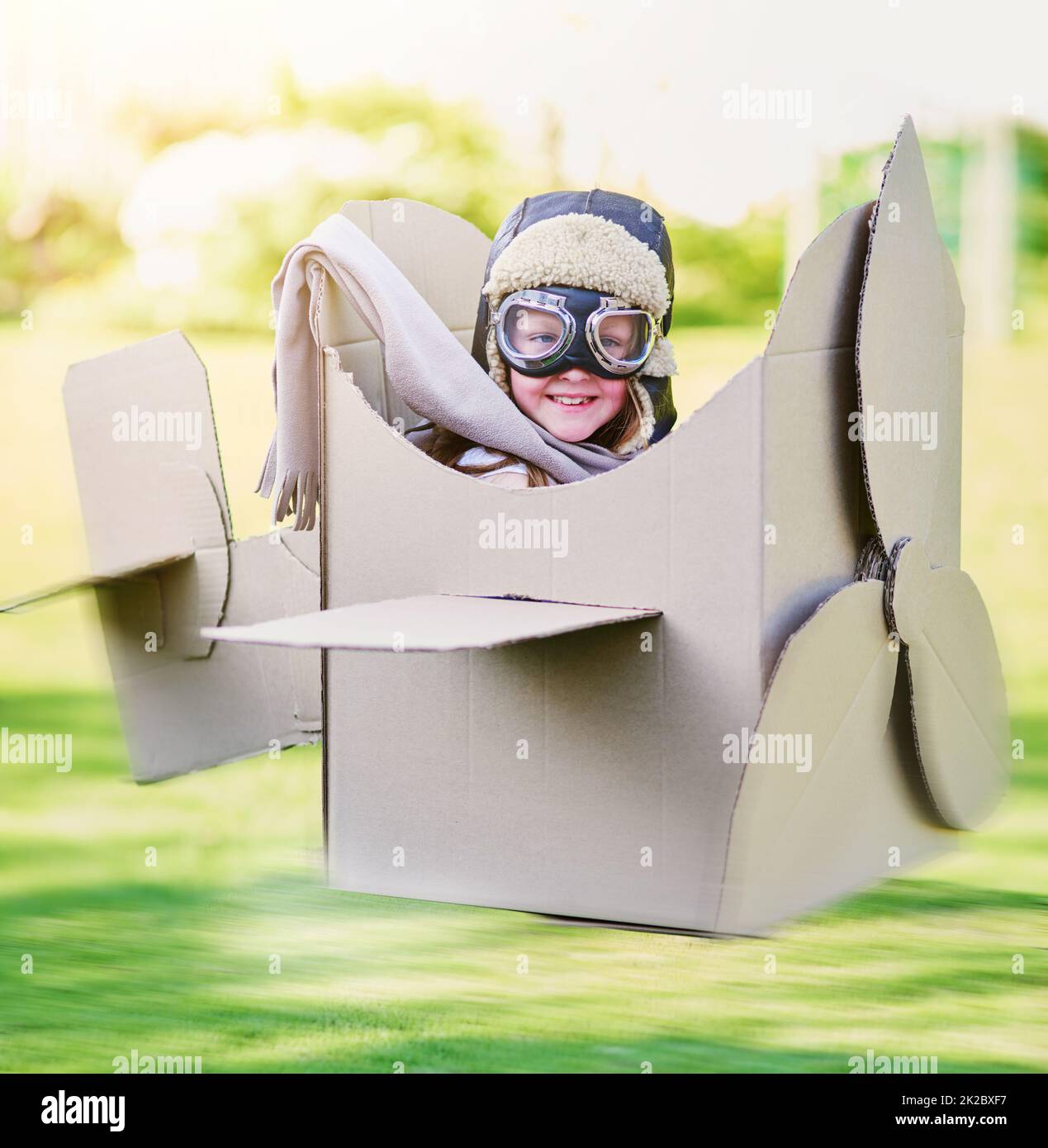 Ready to take to the sky. Portrait of a little boy pretending to fly in ...