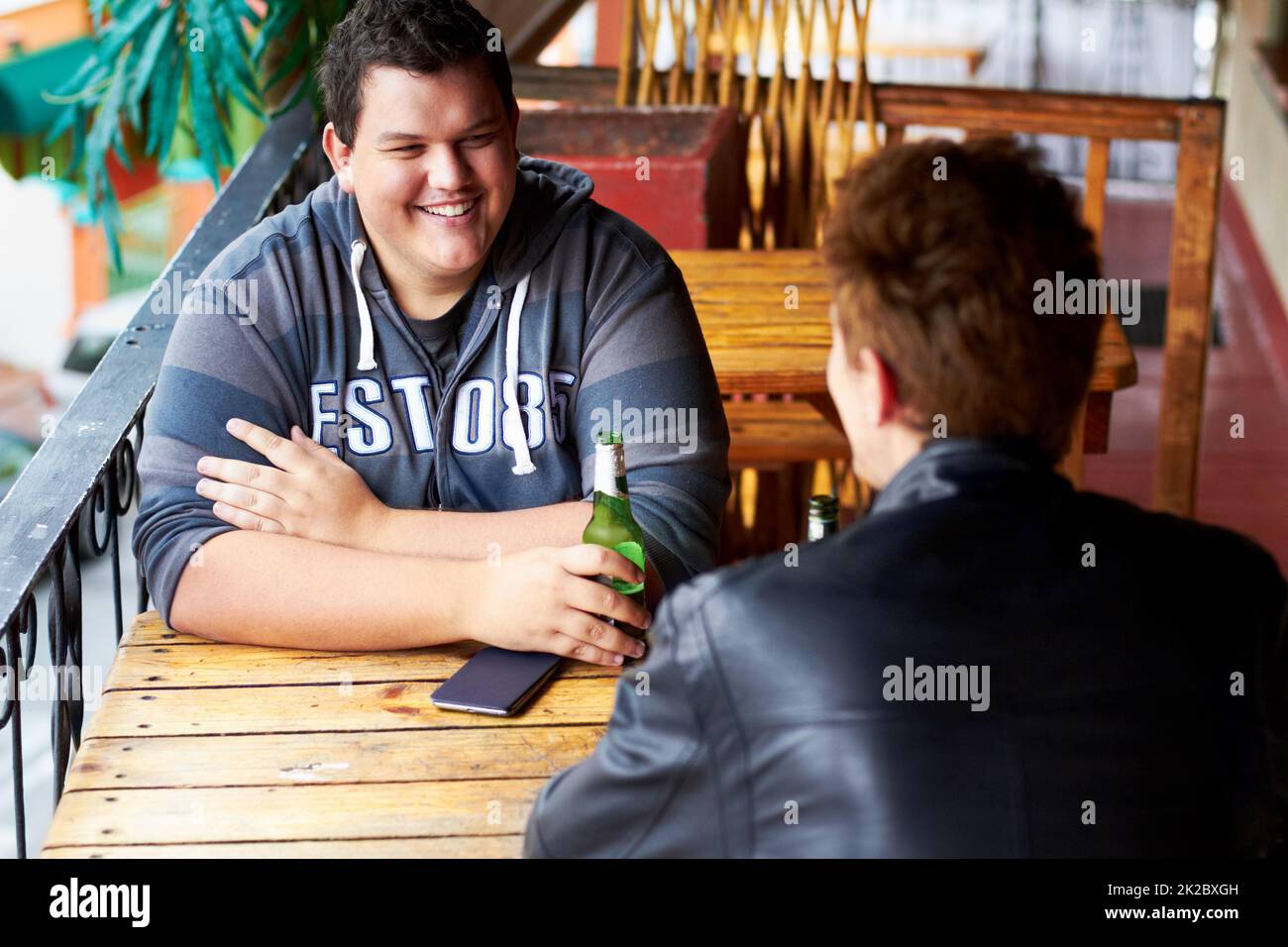 Fat person sitting restaurant hi-res stock photography and images - Alamy