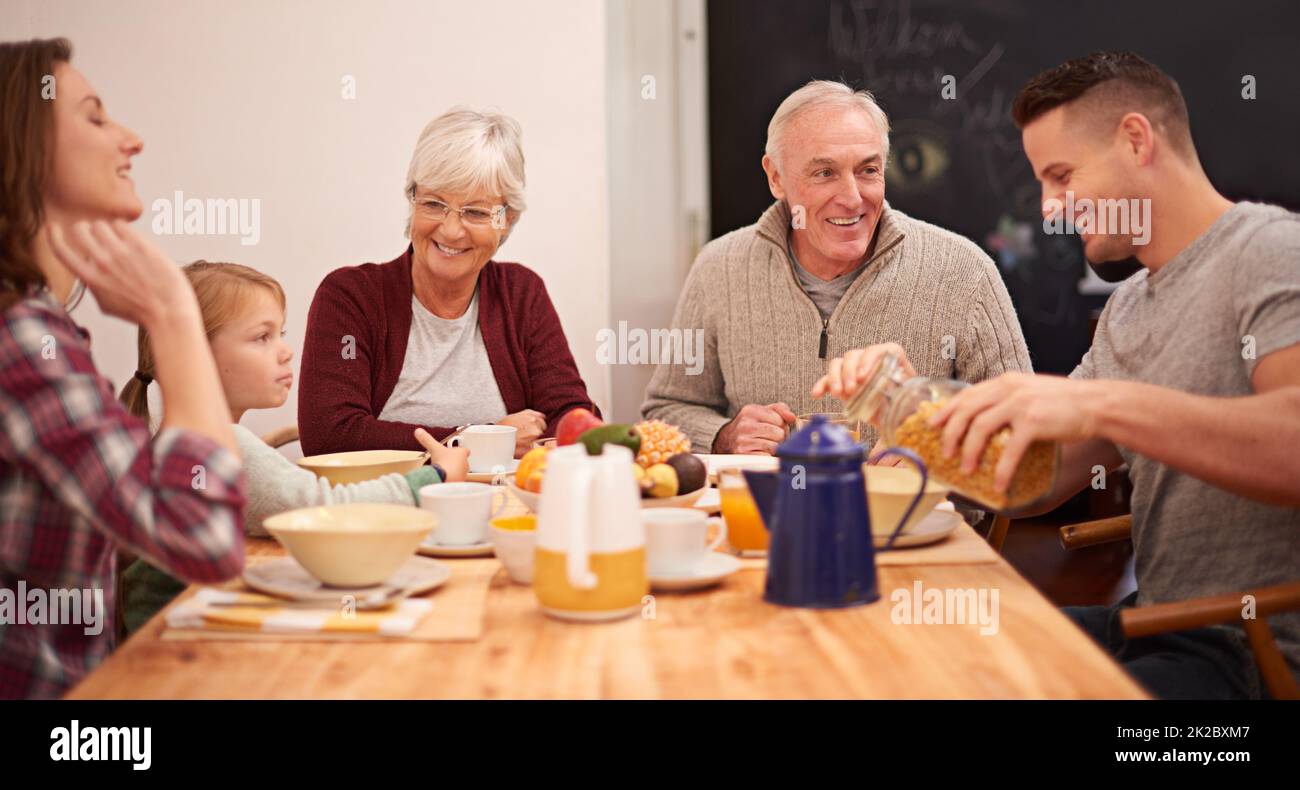 Starting the day with a healthy breakfast. Shot of a multi-generational ...