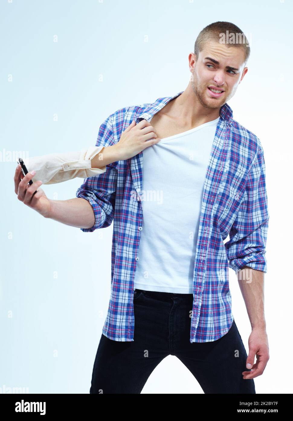 Pulled by shirt hi-res stock photography and images - Alamy