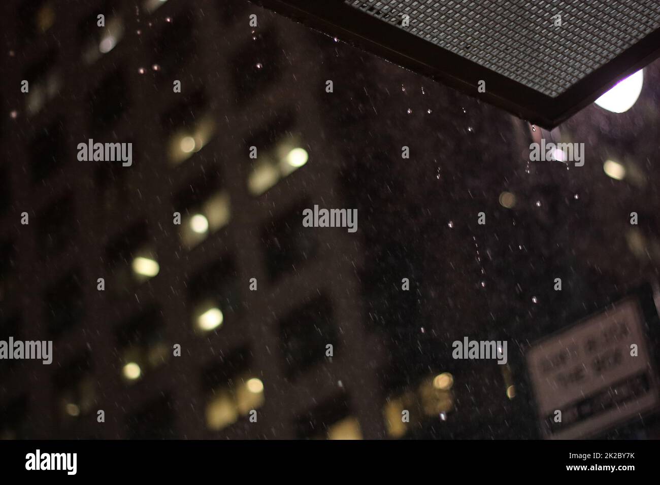 Hiding from rain in New York Stock Photo - Alamy