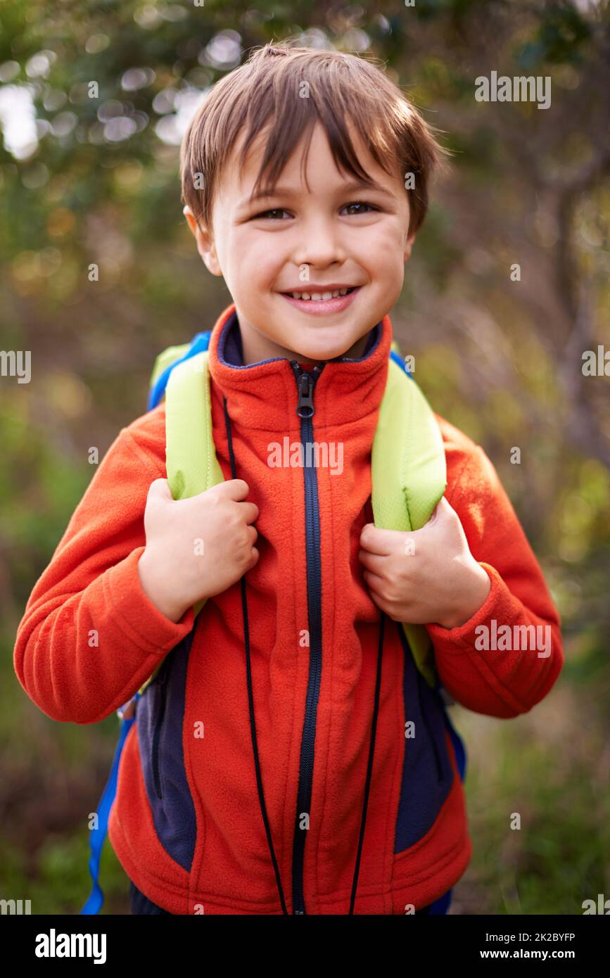 Im ready for adventure. Portrait of an adorable little boy ready to go ...
