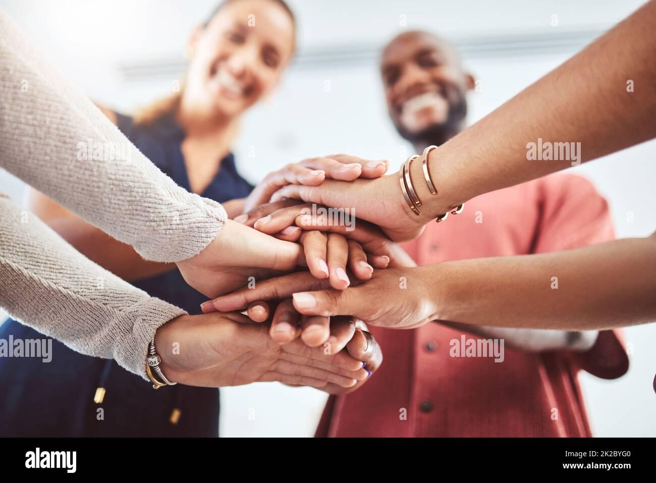 Hand, teamwork and motivation with a business team and their hands in a ...