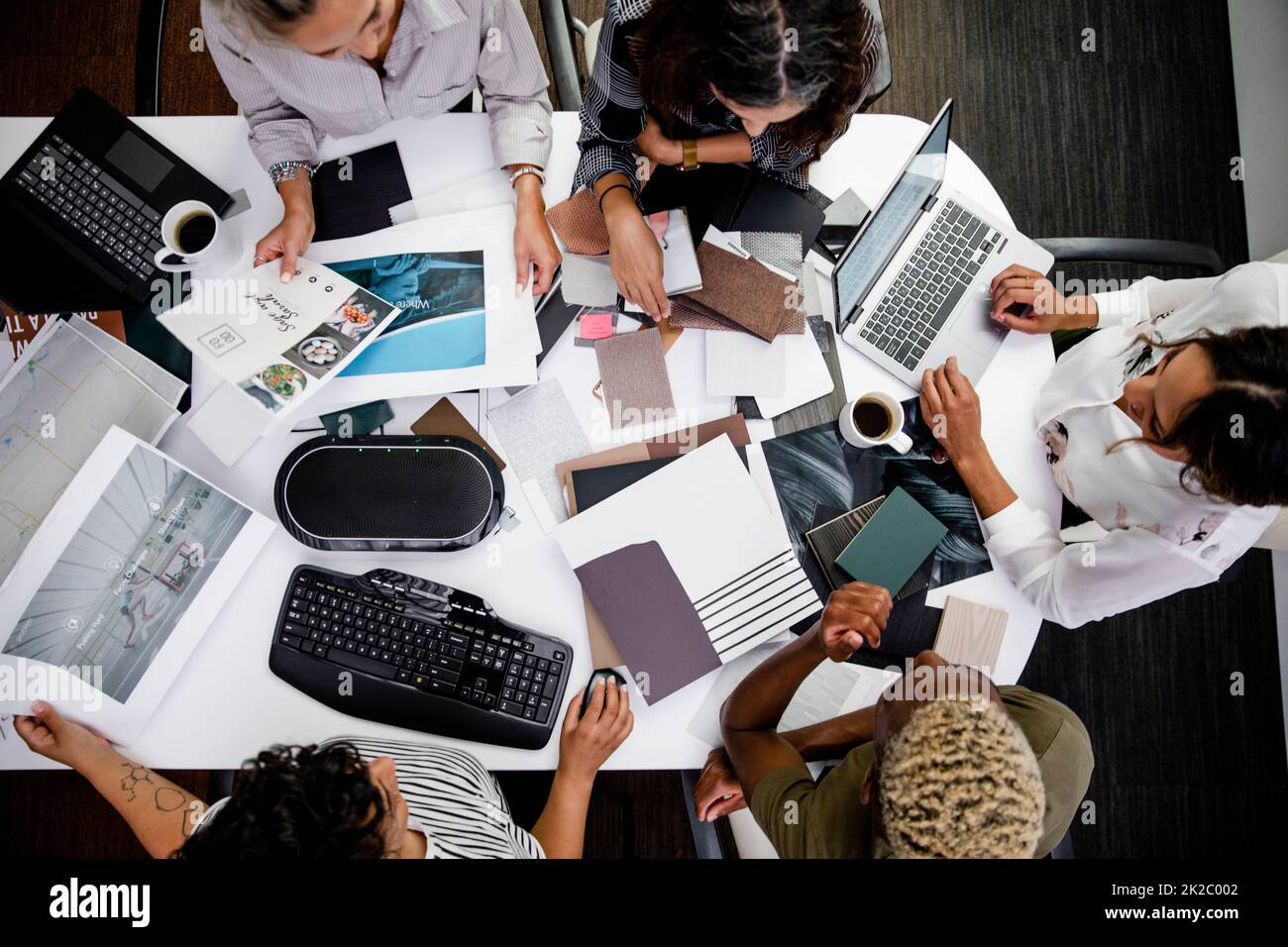 Five man team overhead hi-res stock photography and images - Alamy