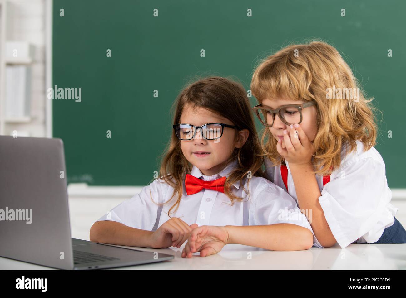 School friends learning together. Happy girl and boy school friends ...
