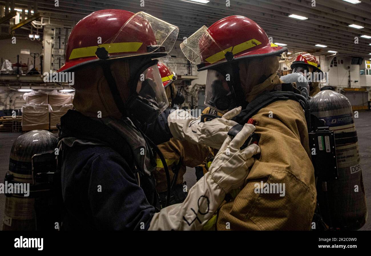 220912-N-DP708-1408 PACIFIC OCEAN (Sept. 12, 2022) – Sailors don ...