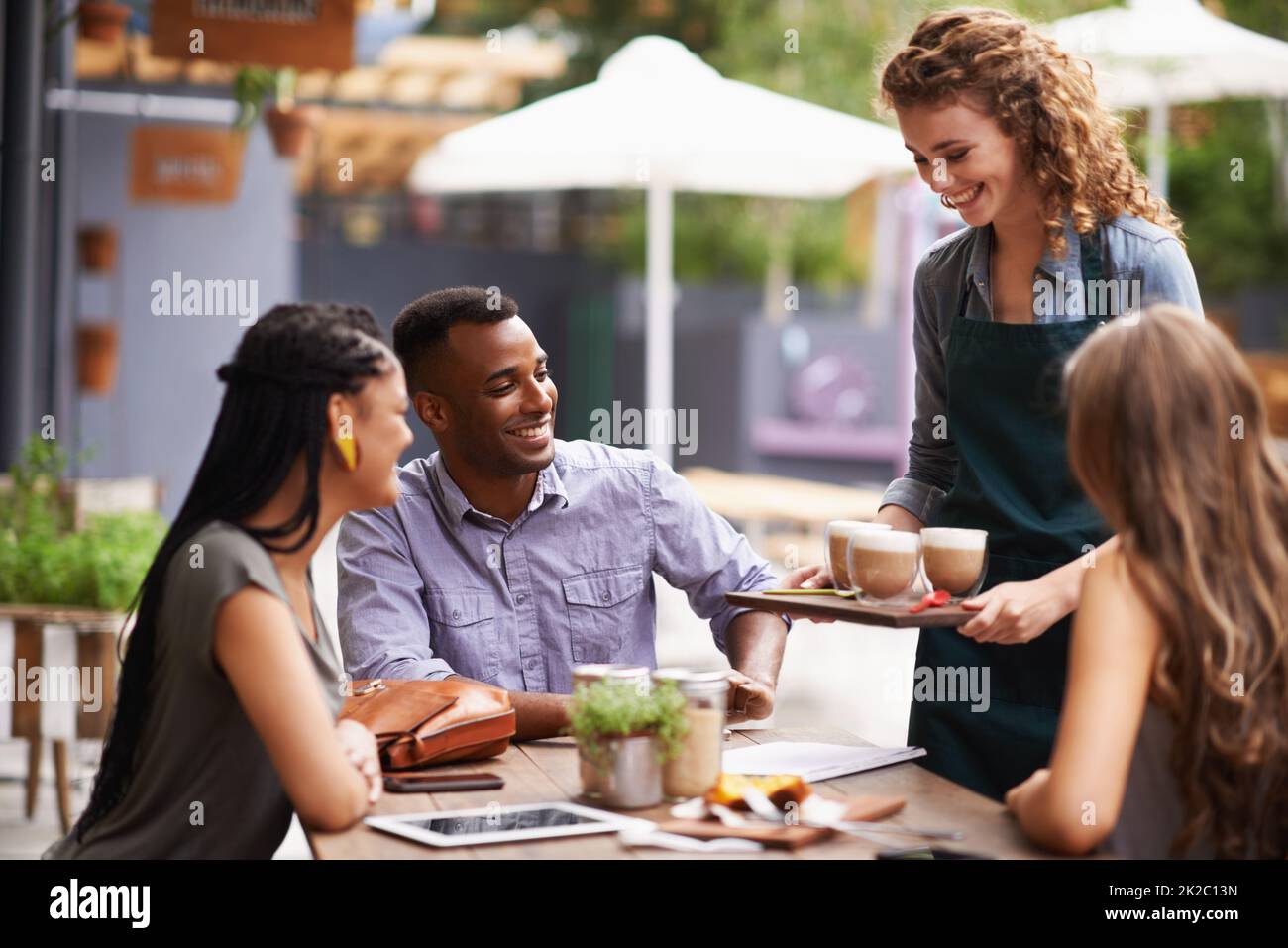 Customers relaxing together hi-res stock photography and images - Alamy