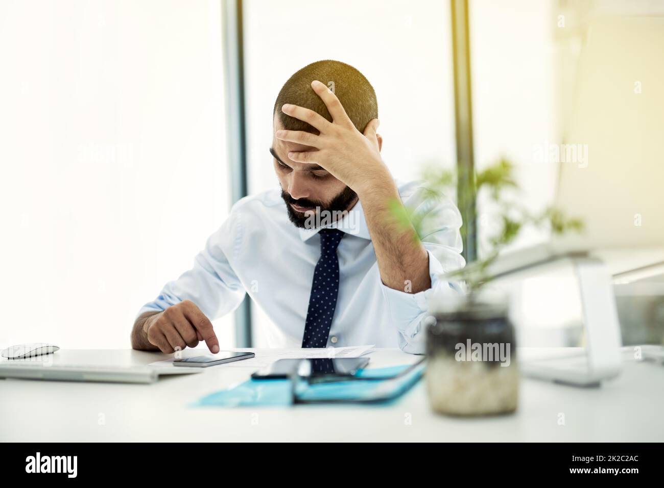 Confident businessman sitting desk office thinking hi-res stock ...