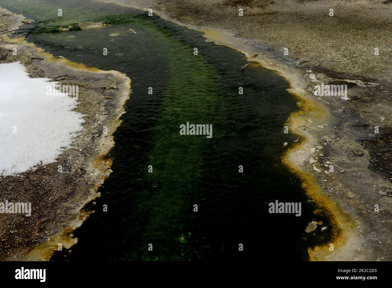 Water Runoff from Winter Snowing Geothermal Pool Yellowstone Stock ...