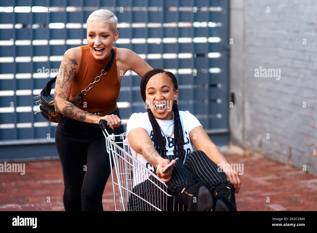 Pushing female hi-res stock photography and images - Alamy