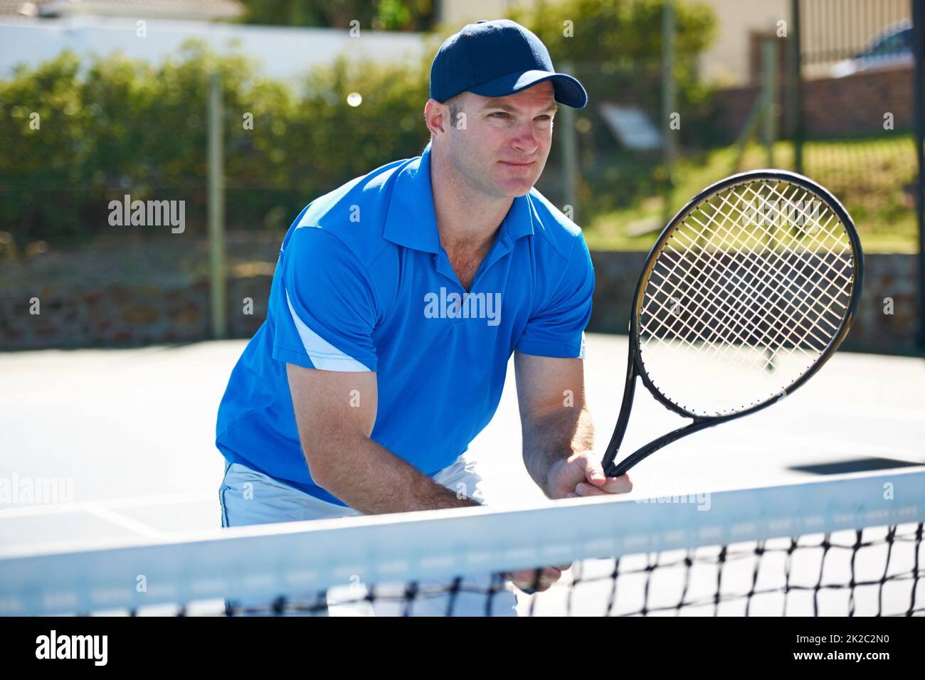Service return tennis male hi-res stock photography and images - Alamy