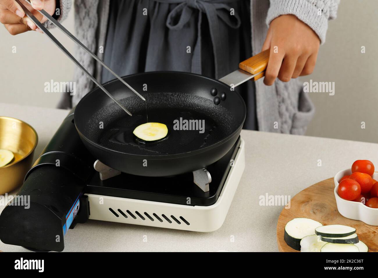 Cooking Hobak Jeon, Korean Zucchini Pancake in the Kitchen, Put Sliced ...