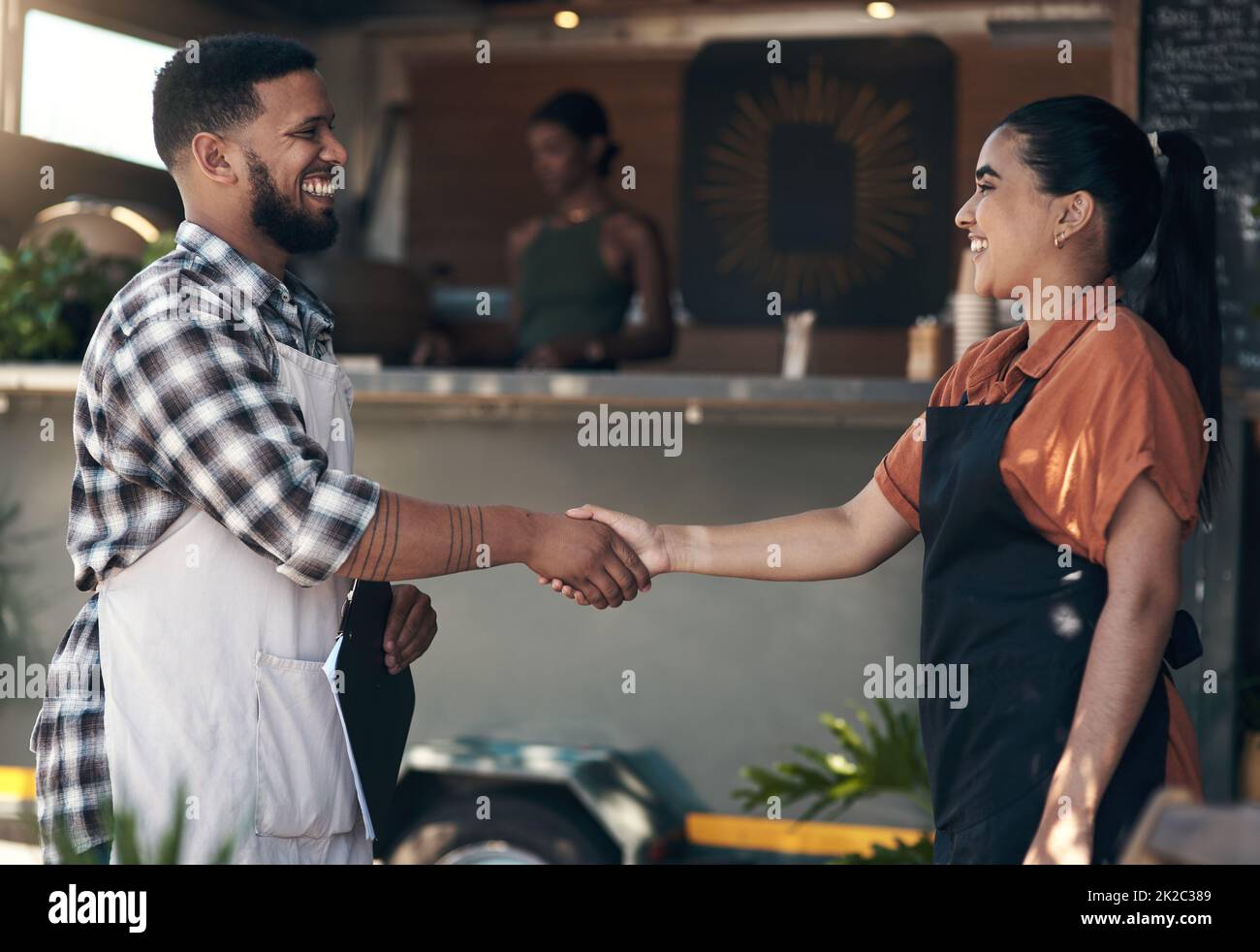 Young employee shaking hands with boss hi-res stock photography and ...