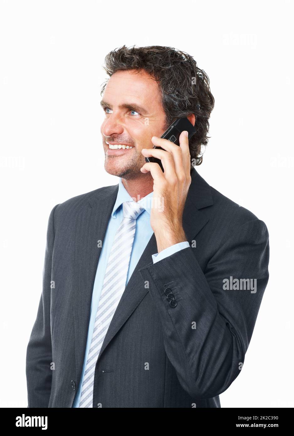 Mobile phone conversation. Handsome mature business man talking on ...