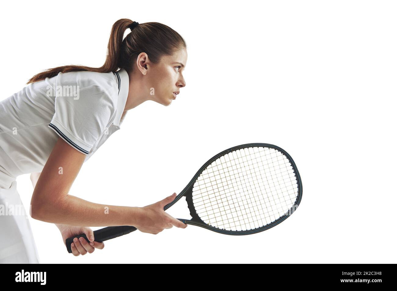 Playing tennis takes balls. Studio shot of a female tennis player ...