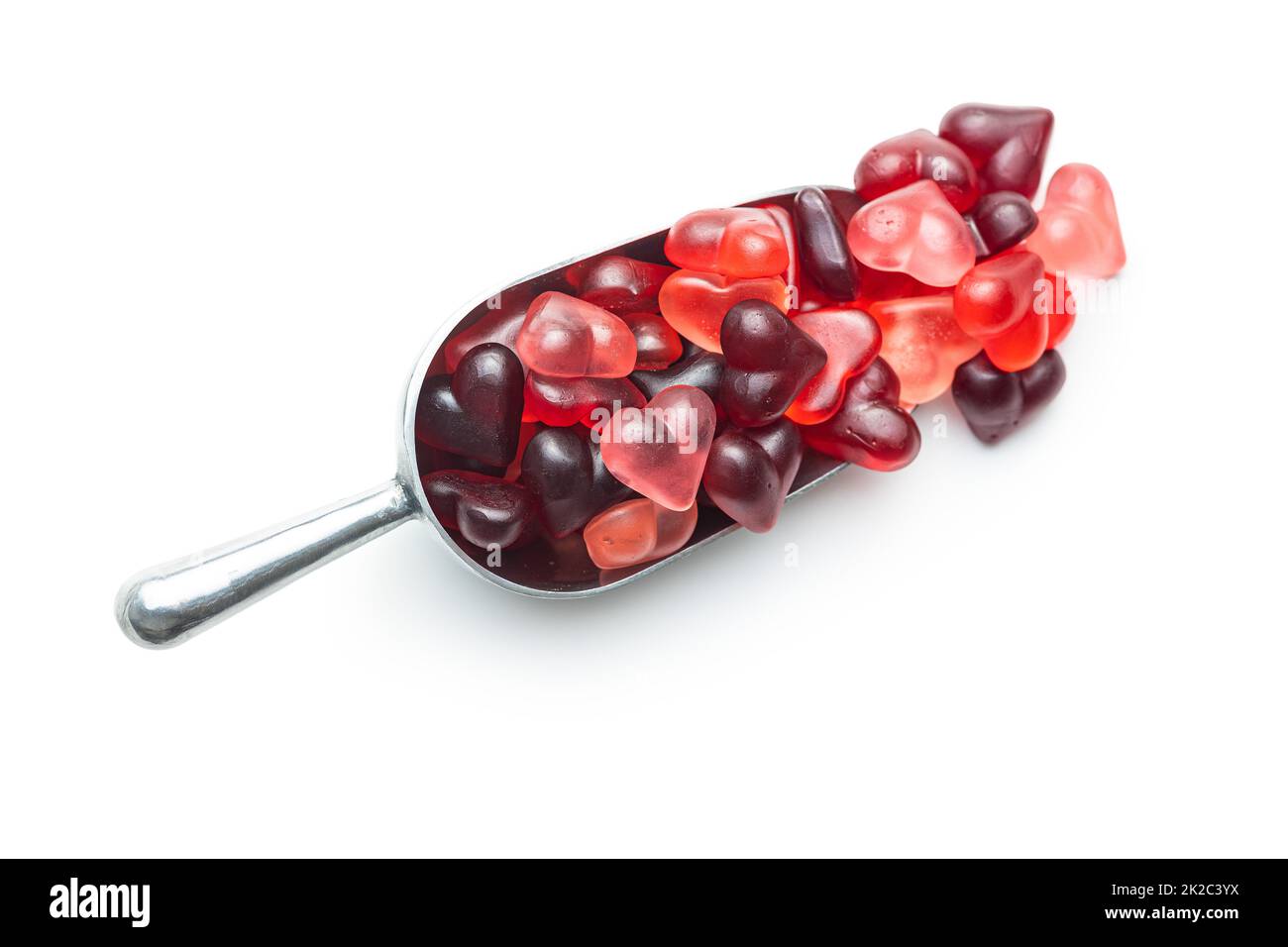 Heart shaped jelly candy in scoop isolated on white backgorund Stock ...