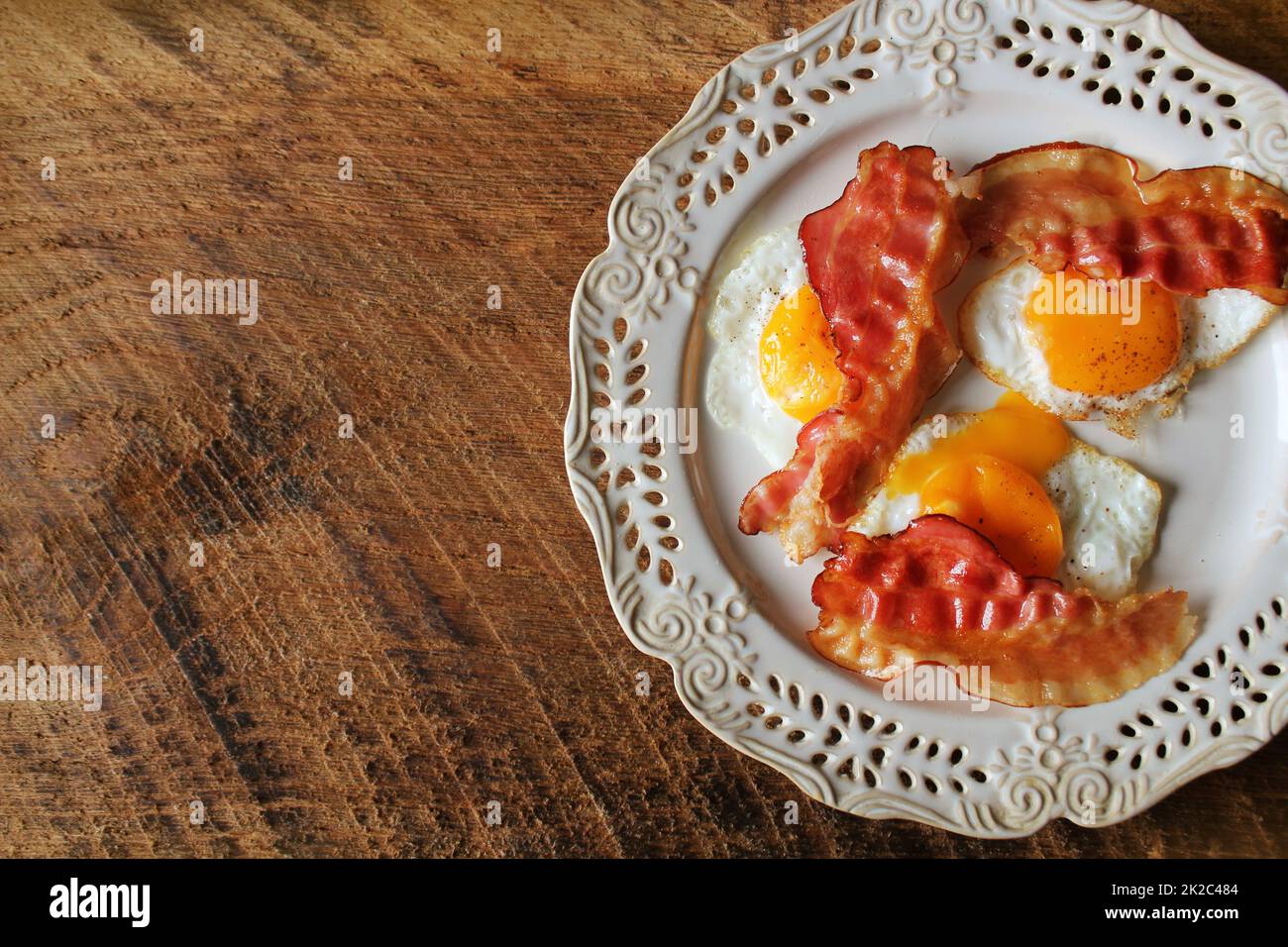 Breakfast , crispy bacon, fried eggs and bread. Sandwiches on white ...