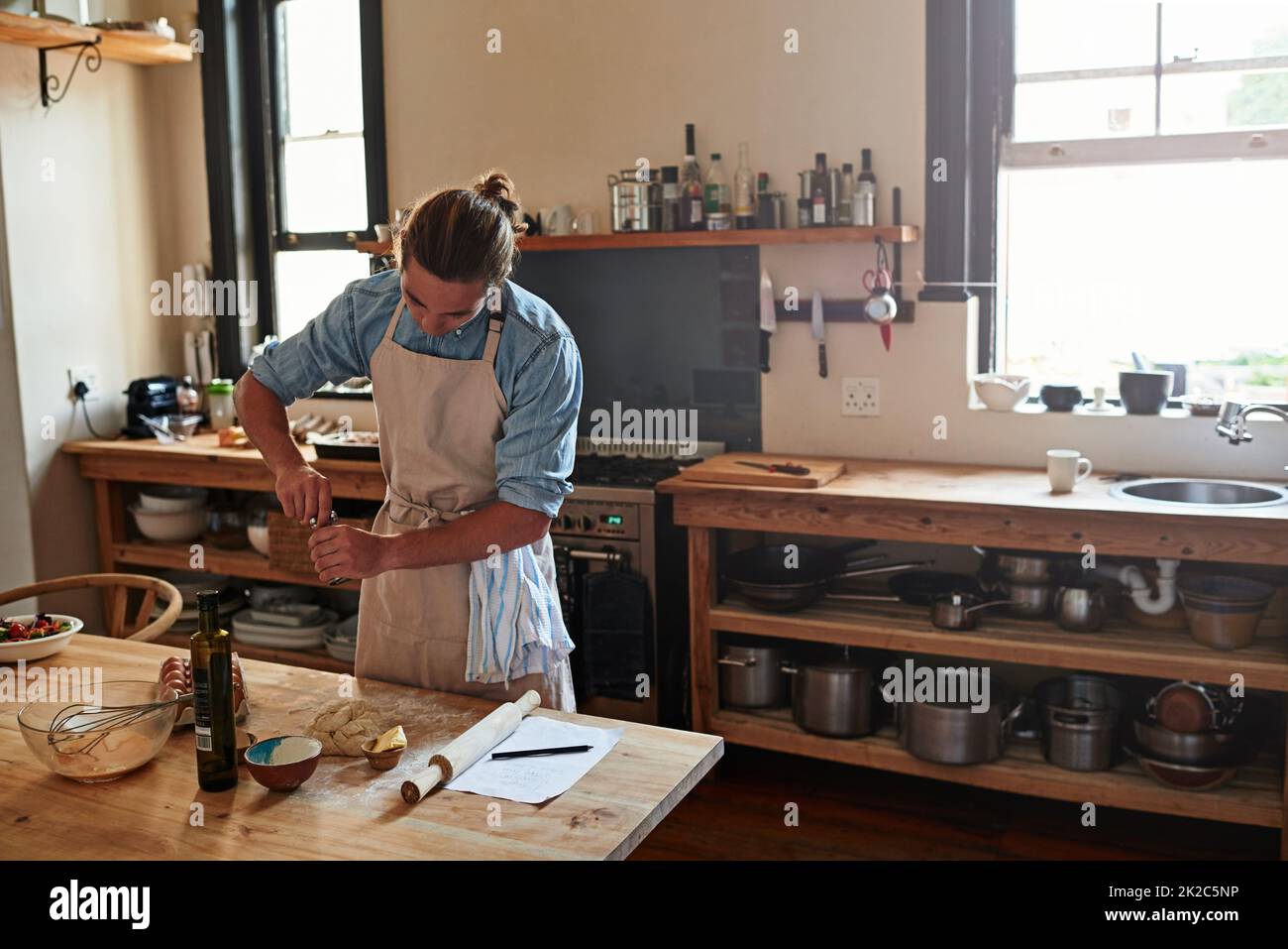Man and baking hi-res stock photography and images - Alamy