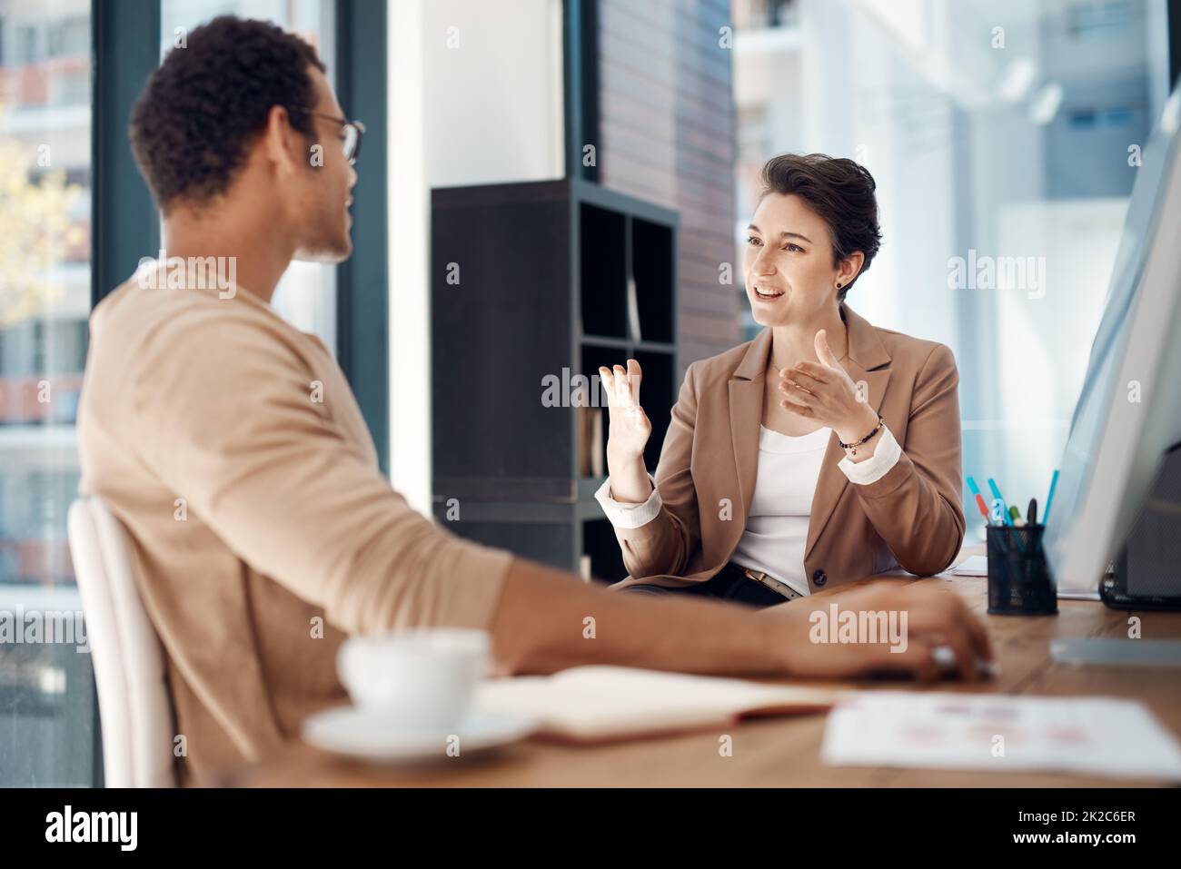 Two men point hi-res stock photography and images - Alamy