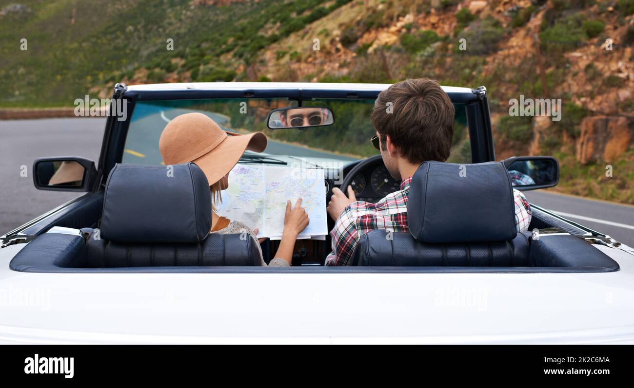 Woman in car reading a map hi-res stock photography and images - Alamy