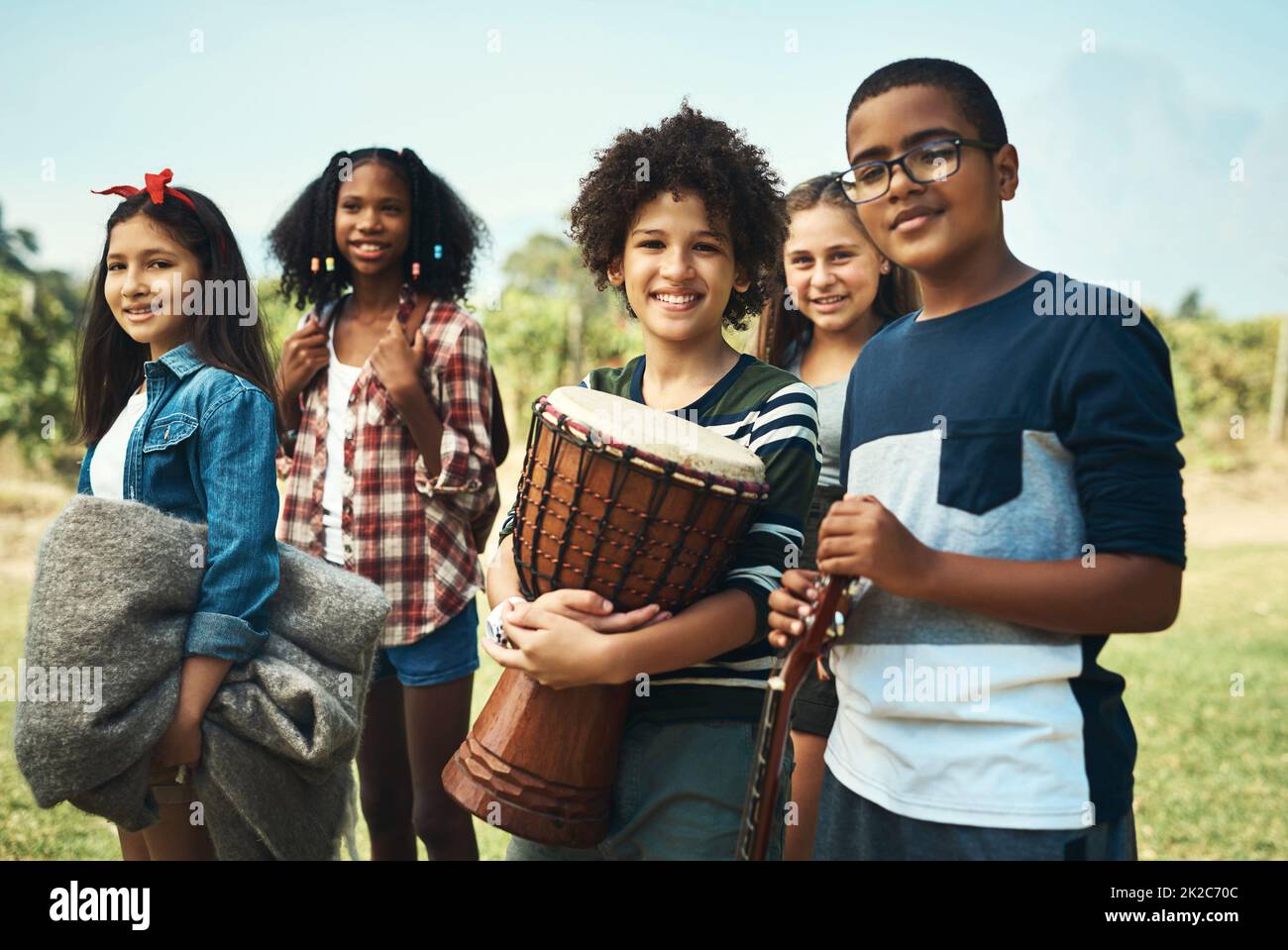 Boy playing musical instruments hi-res stock photography and images - Alamy