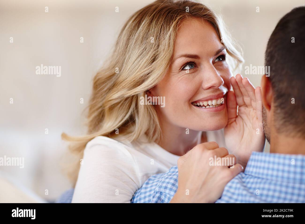 Woman whispering in secret hi-res stock photography and images - Alamy
