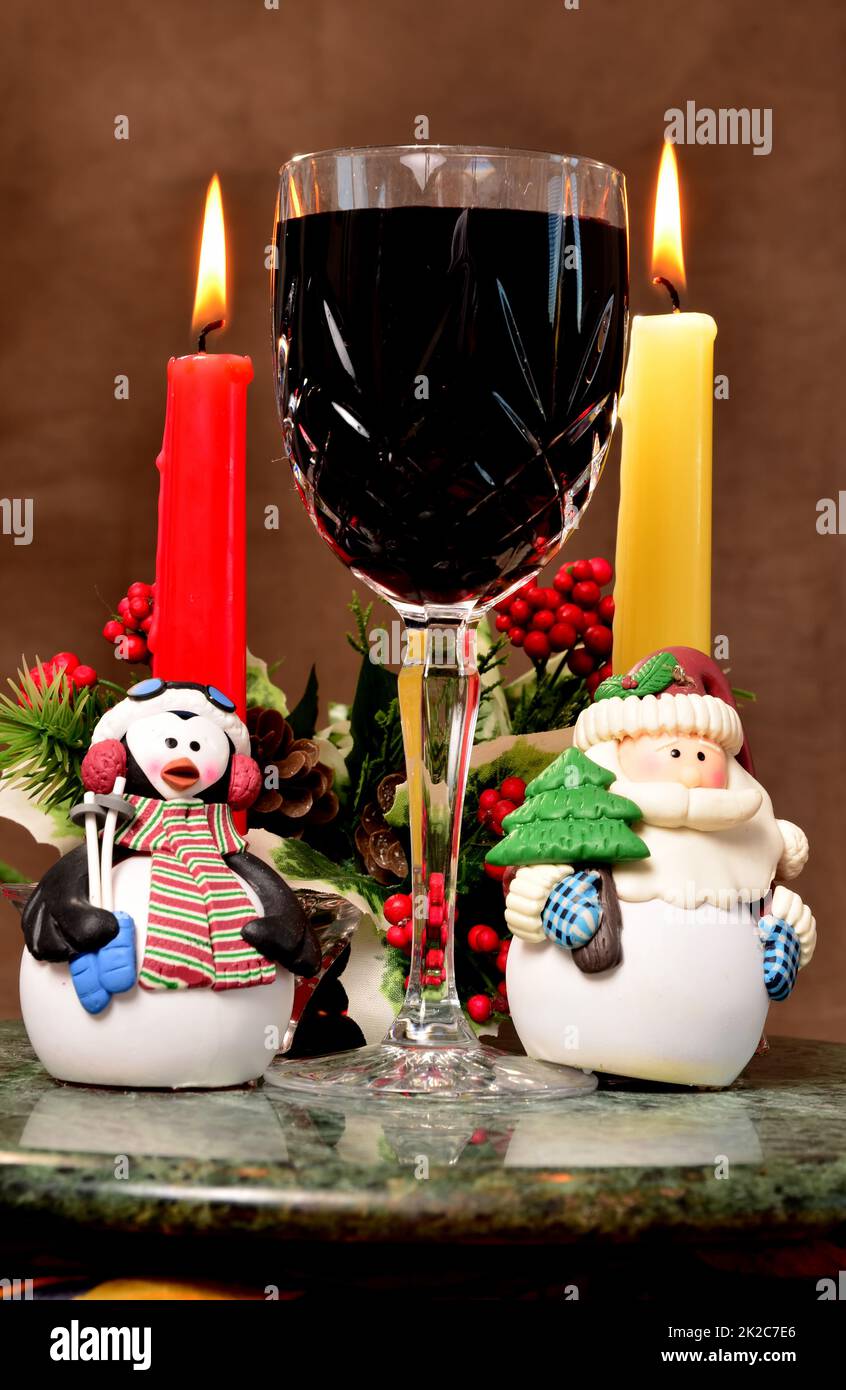 Christmas wine glass with Christmas figures Stock Photo - Alamy
