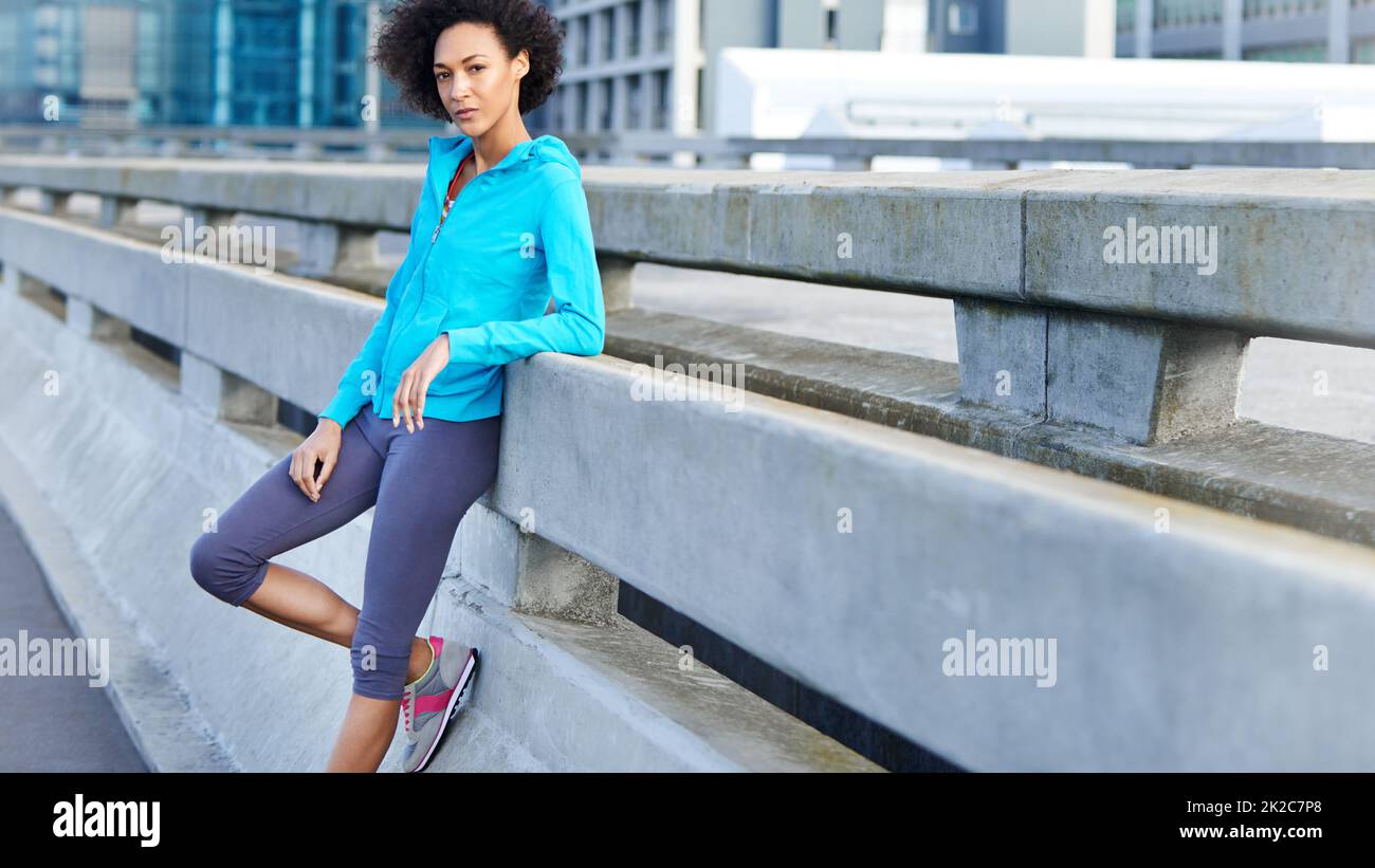 Female leaning against railing looking hi-res stock photography and ...