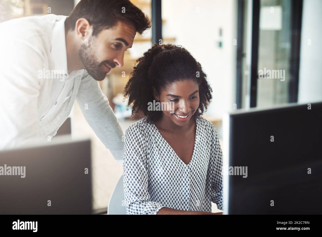 Businessman helping colleague hi-res stock photography and images - Alamy