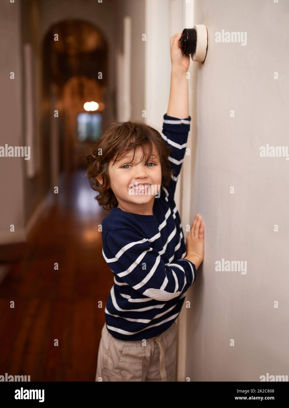 Eco conservation starts young. A cropped shot of a little boy switching ...