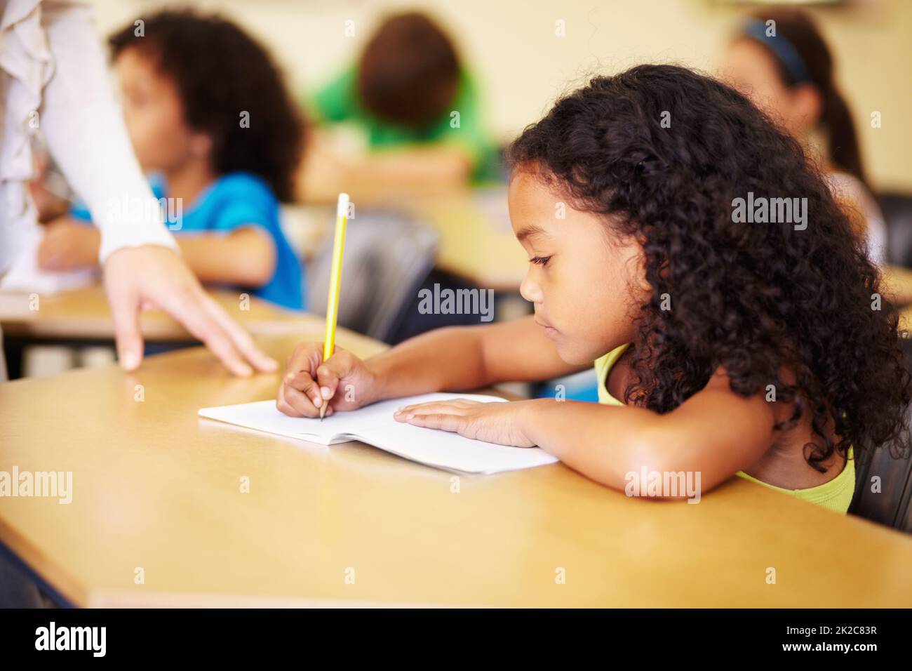 Girl helping boy homework desk hi-res stock photography and images - Alamy