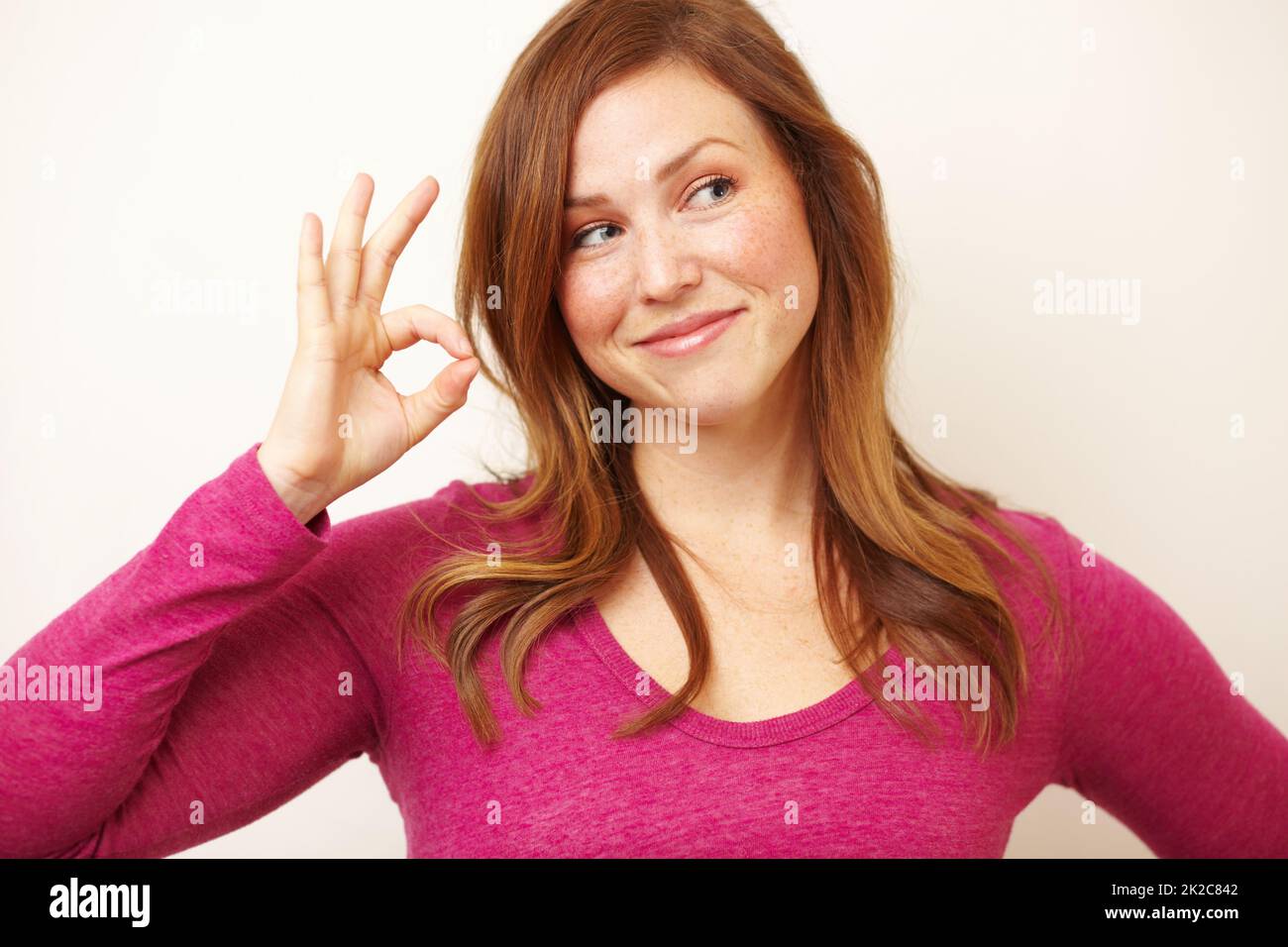 Smiling standing looking away gesturing hi-res stock photography and ...
