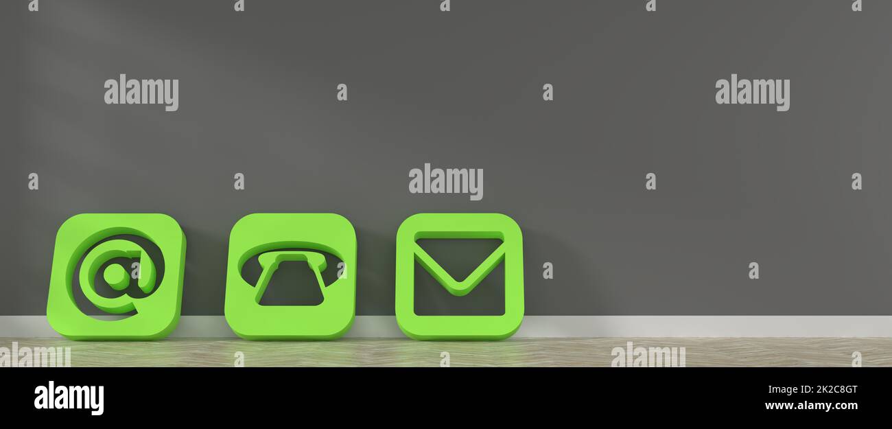 Big green contact icons in a grey room Stock Photo - Alamy