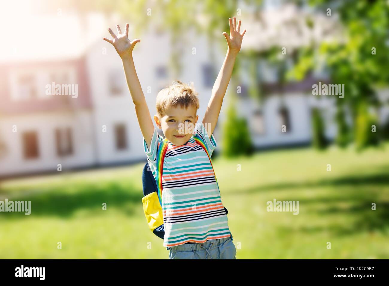 Boy going to study in primary school at first time Stock Photo - Alamy