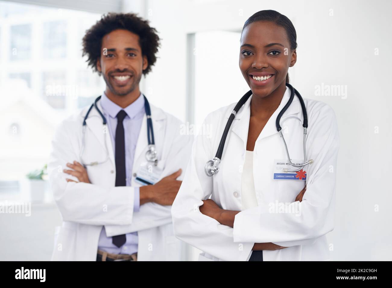 Theyre dedicated to medicine. Portrait of two doctors standing in a ...