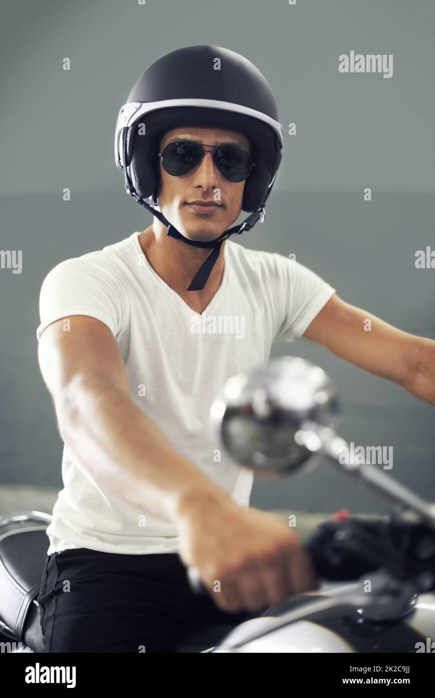 Young man with motorcycle helmet hi-res stock photography and images ...