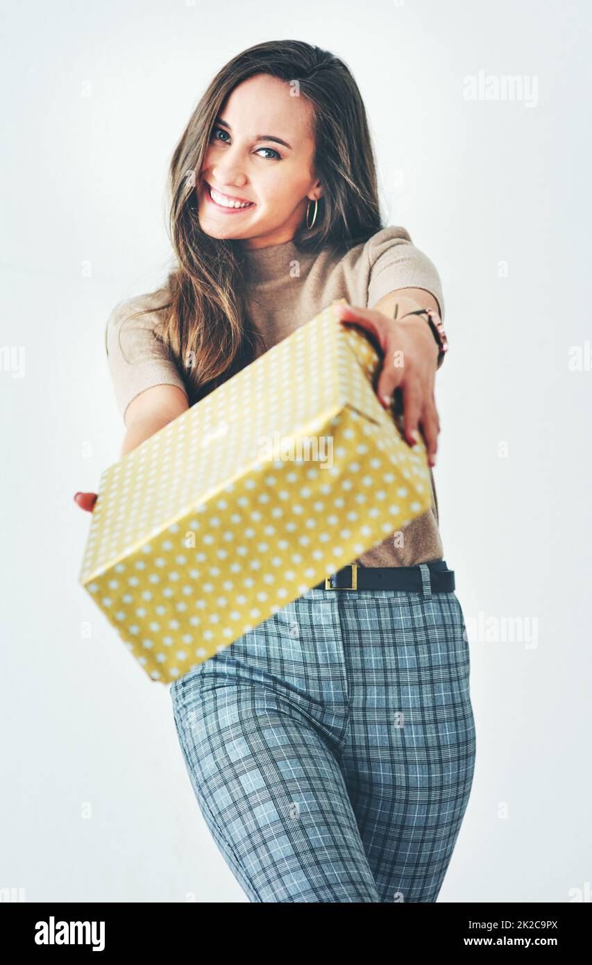 Heres a gift from me to you. Portrait of an attractive young woman ...