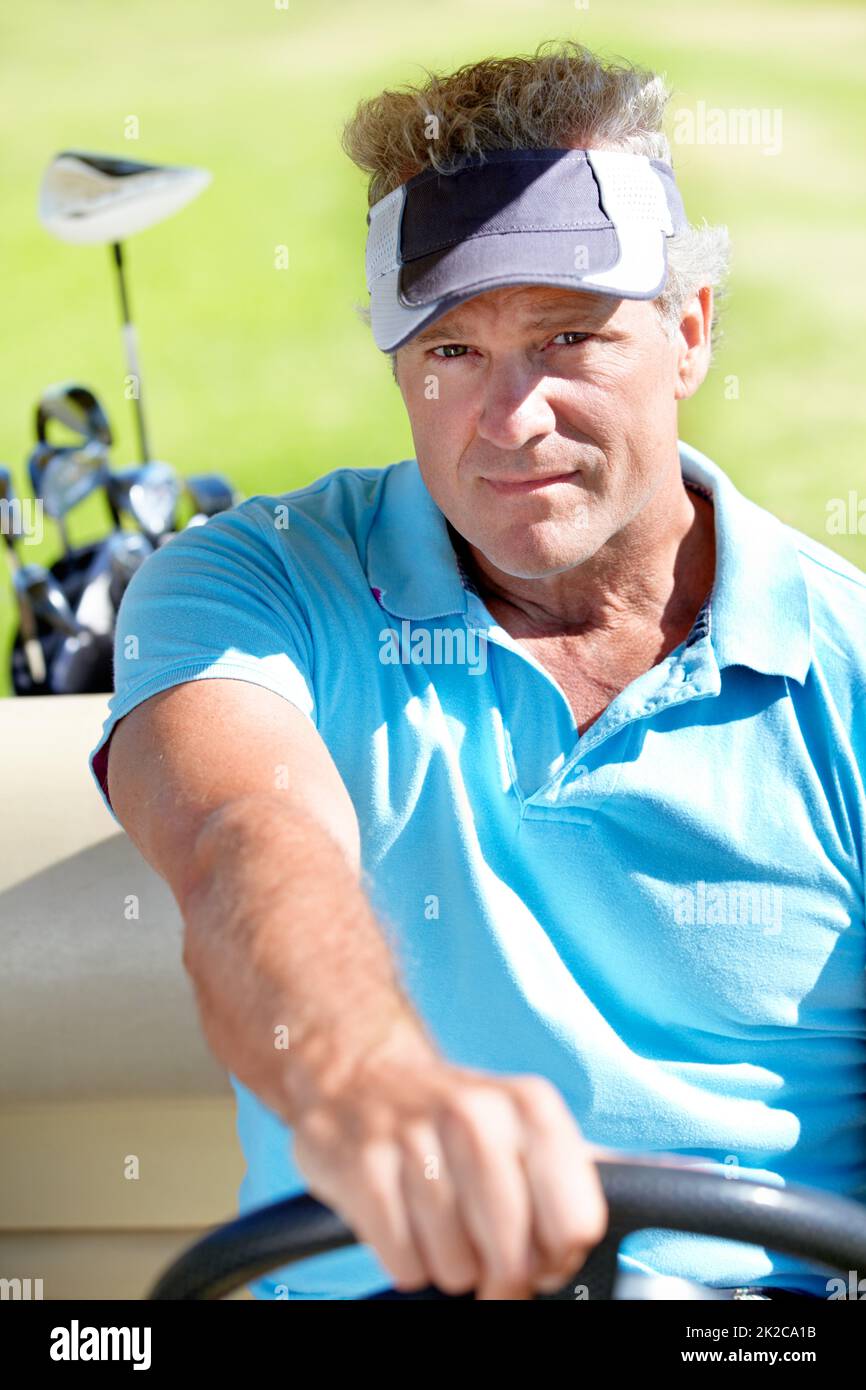 Man in a golf cart hi-res stock photography and images - Alamy