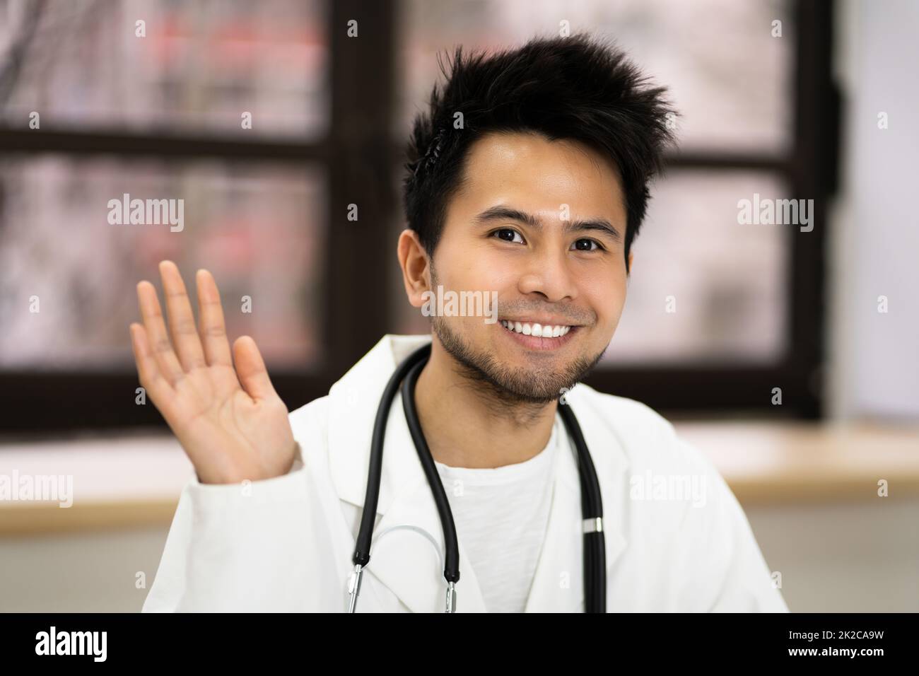 Doctor waving goodbye hi-res stock photography and images - Alamy