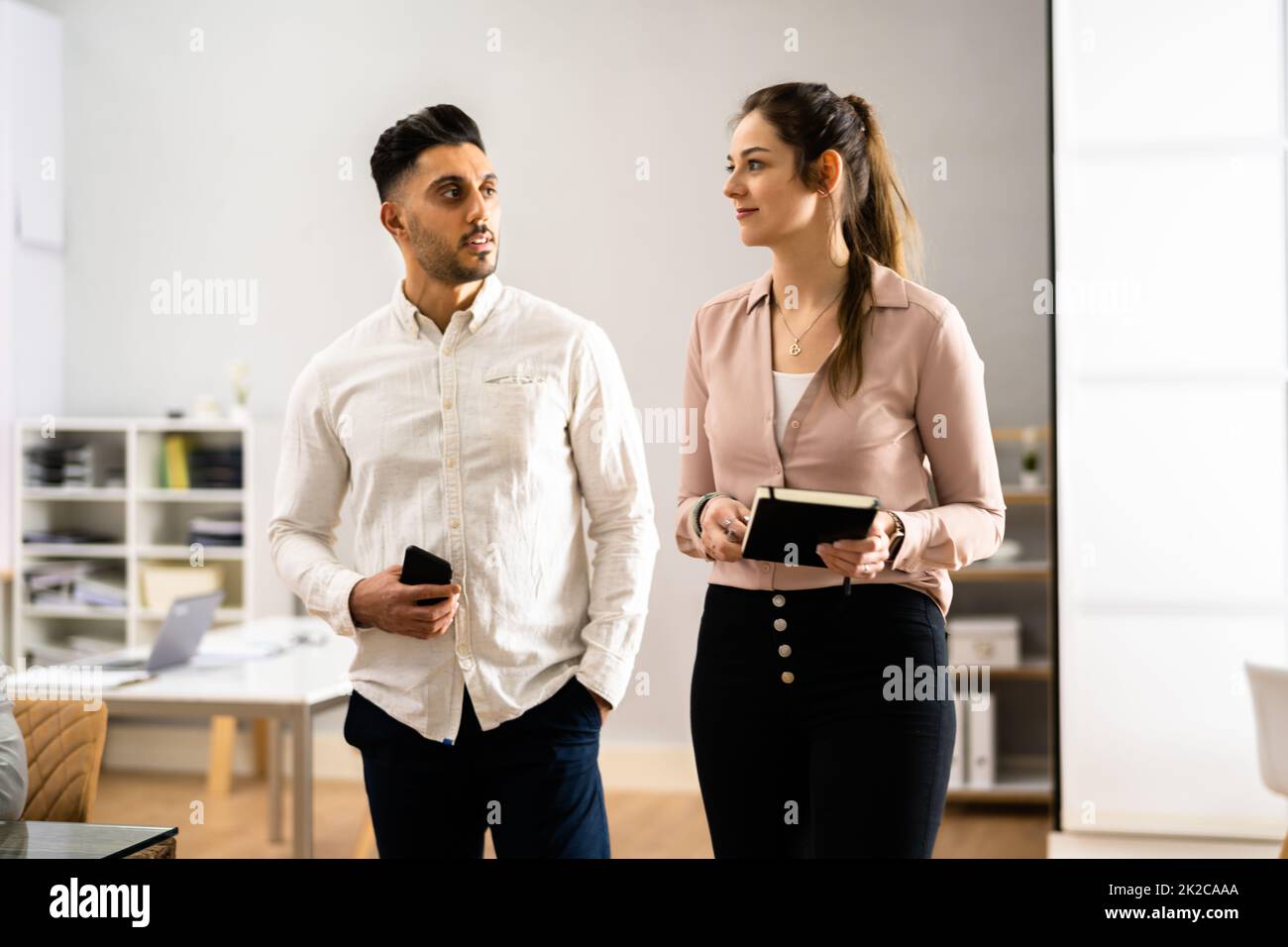 Two Business People Talking Stock Photo - Alamy Two Business People Talking Stock Photo - Alamy