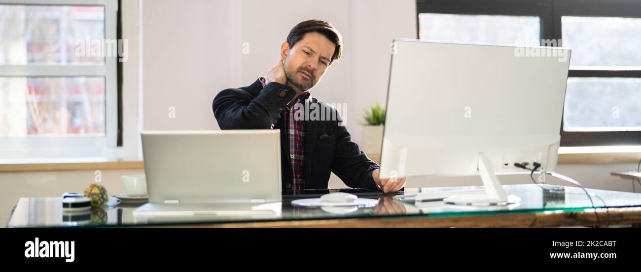 Neck Pain And Stress. Bad Posture At Computer Stock Photo - Alamy