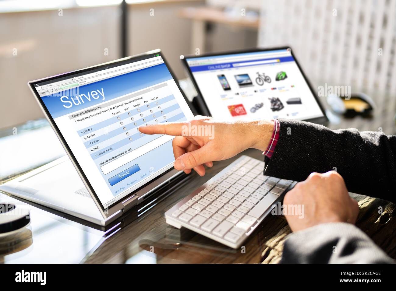 Close-up Of A Man Filling Online Survey Form Stock Photo - Alamy