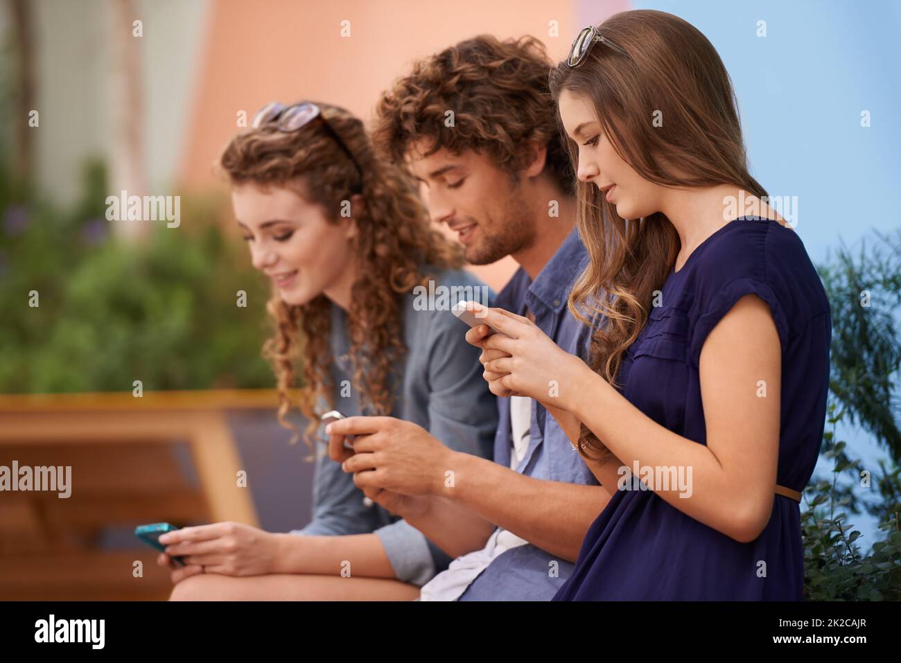 None of those awkward silent moments here.... Three young adults using ...