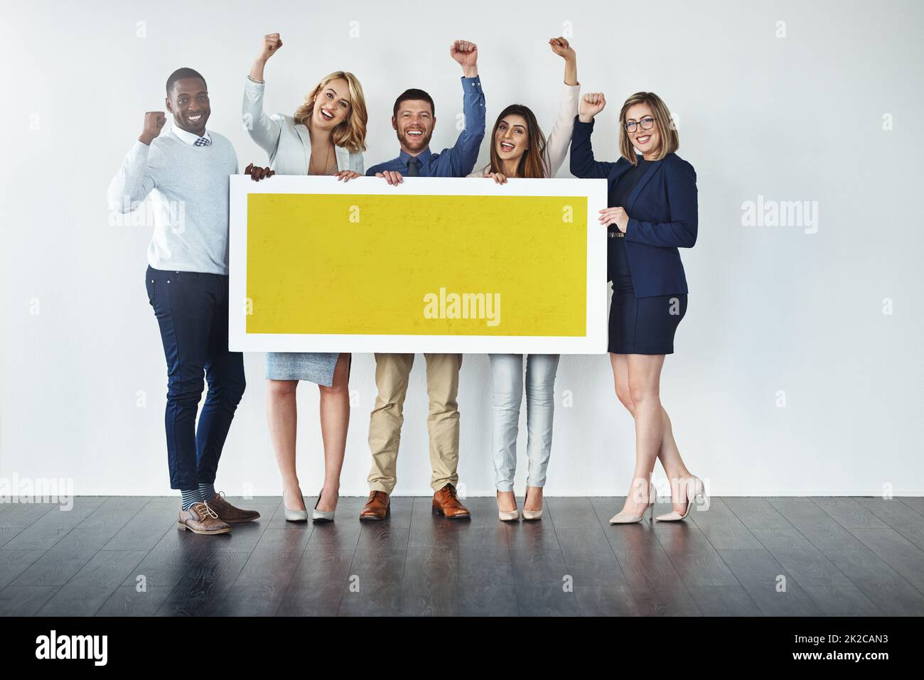 Standing smiling holding placard support cheering hi-res stock ...