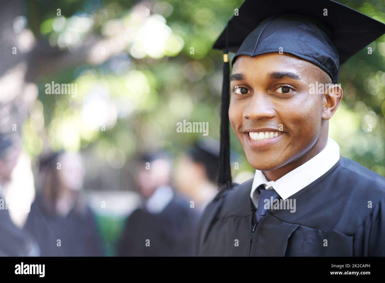 Portrait man wearing graduation cap hi-res stock photography and images ...